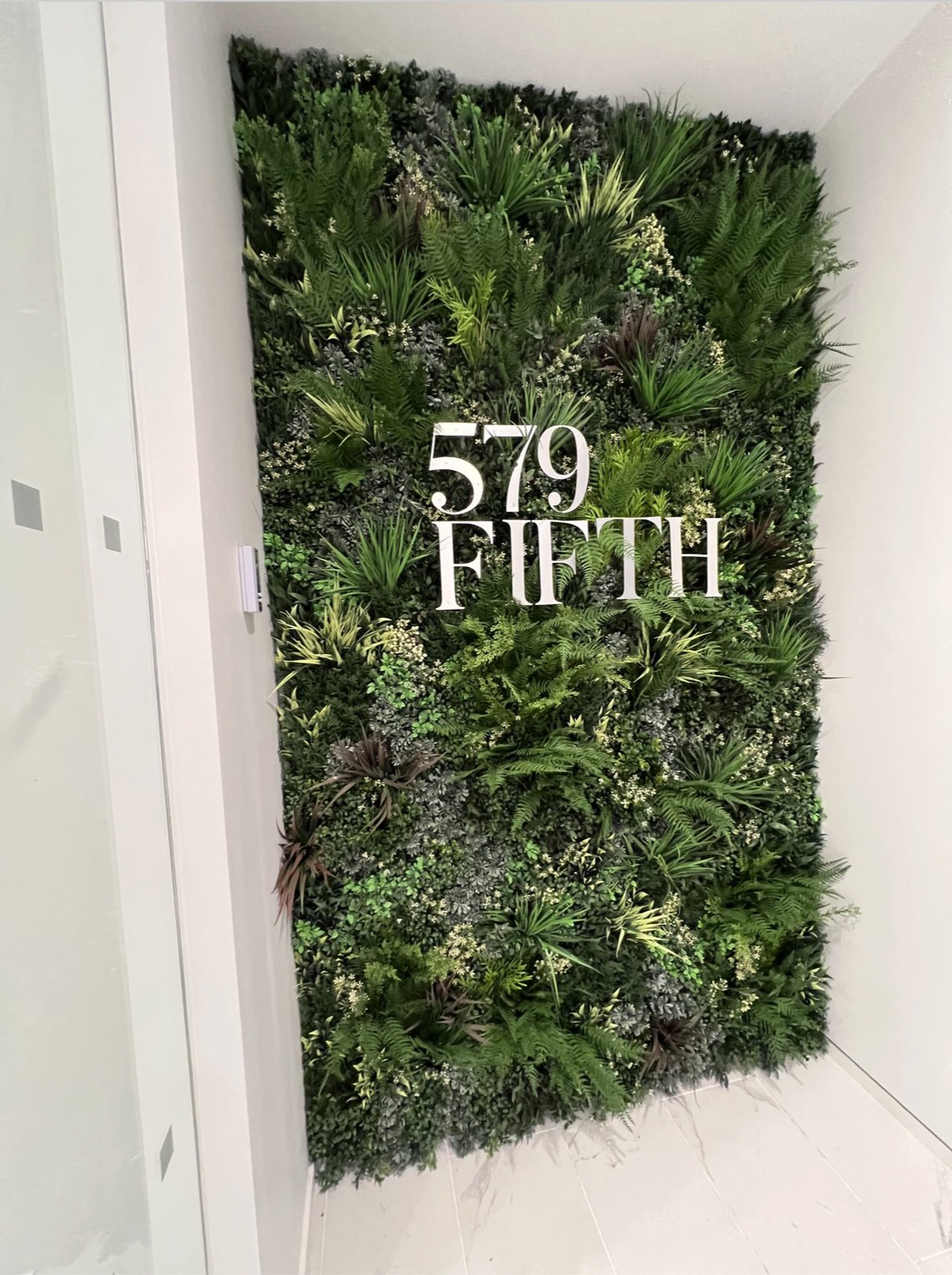 CORPORATE: Small-Scale Green Wall with Integrated Signage at 579 Fifth ...